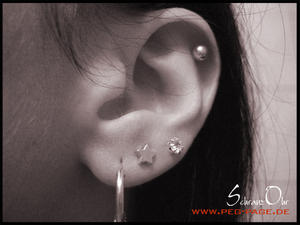pierced ear by schranzohr on DeviantArt
