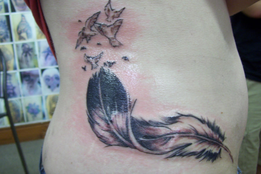 Big Ass Feather And Little Ass Birds Tattoo By Spartacustattoos On