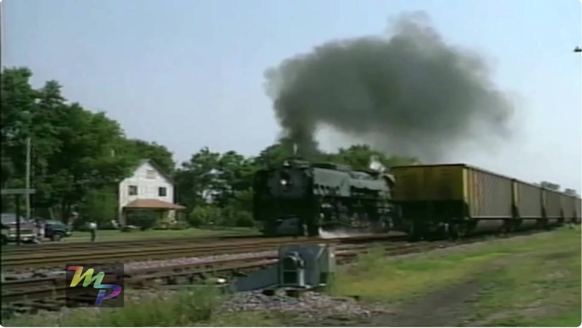 Union Pacific 844 Appears from behind hoppers by SCH2008 on DeviantArt